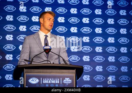 North Carolina quarterback Max Johnson (14) and receiver Nathan Leacock ...