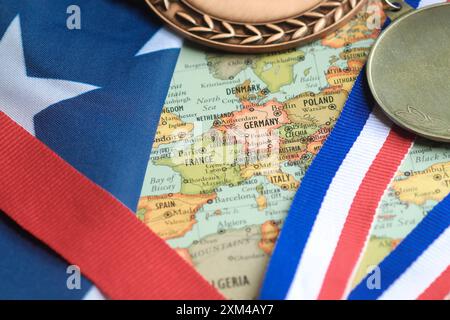 Macro image of Europe map with medals and US flag Stock Photo - Alamy