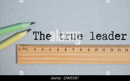 THE TRUE LEADER text written on sticky on grey background Stock Photo ...