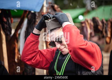 Picture of a woman wearing a sajkaca. The šajkača is the Serbian ...