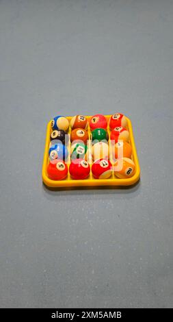 Ball at pool pocket in table corner Stock Photo - Alamy