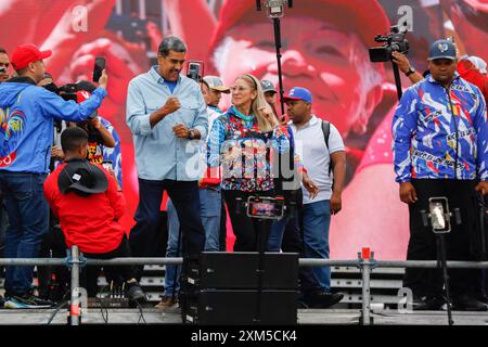 President Nicolas Maduro dances at a rally marking the anniversary of ...