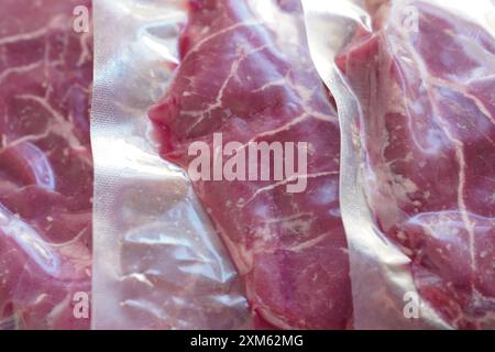 Closeup of Organic beef (osso buco) in a vacuum sealed package with ...