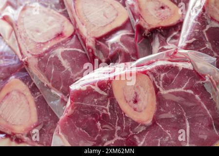 Many vacuum-sealed packagings organic beef (osso buco Stock Photo - Alamy