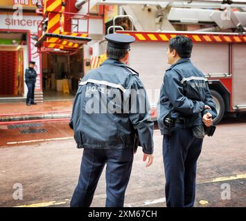 Police officers providing order near the shopping mall Stock Photo - Alamy