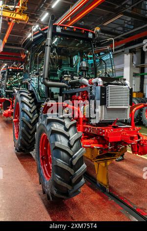 Tractor Manufacturing. Assembly line of agricultural caterpillar ...