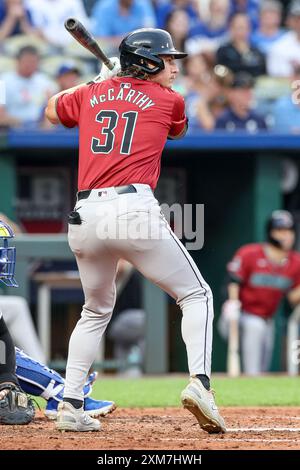Arizona Diamondbacks' Jake McCarthy (31) is out at second against ...