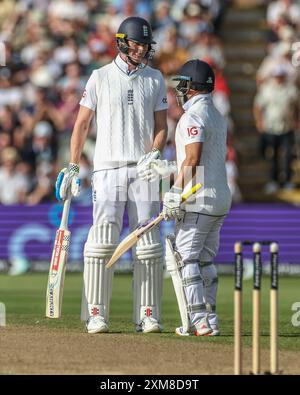 Ben Duckett of England hits the ball high and into the waiting hands of ...