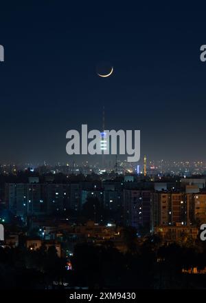 Baghdad Skyline with the Moon Crescent Lighting the Sky Stock Photo - Alamy