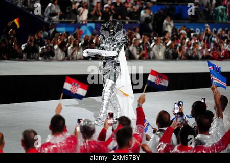 RETRANSMITTING ADDING NAME Floriane Issert carrying the Flag of the ...