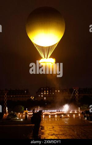 The Olympic Flame rises on a balloon after being lit in Paris, France ...