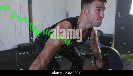 Fitness data tracking image over woman lifting kettlebell in gym ...