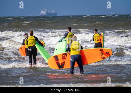 Course for surfers, surfing beginners, on the beach of Scheveningen ...