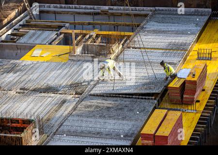 Construction site, installation of semi-precast floor slabs, which are ...