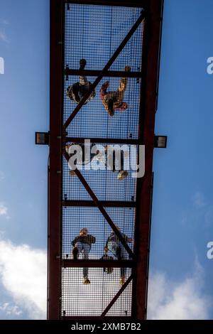 Lattice walkway, people walk over a walkway at a height of a good 15 ...