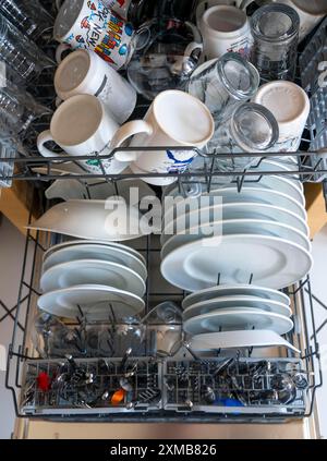 Dishwasher, full of clean crockery Stock Photo - Alamy