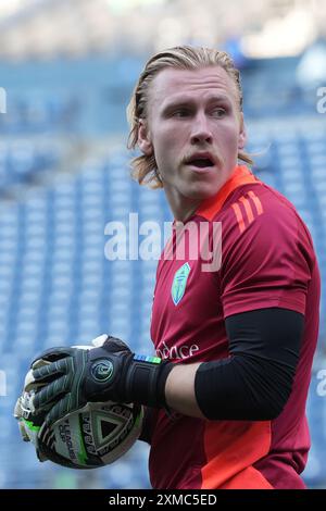 Seattle Sounders FC goalkeeper Andrew Thomas (26) lifts the Leagues Cup ...