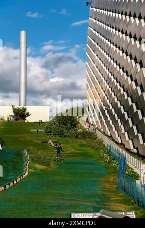 CopenHill, waste incineration plant and artificial ski slope, skiing with a view of the ski lift ...