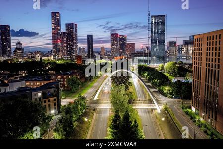Manchester skyline and Hulme Arch near Manchester Metropolitan ...