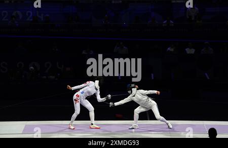 Hong Kong's Man Wai Vivian Kong (left) and Estonia's Nelli Differt ...