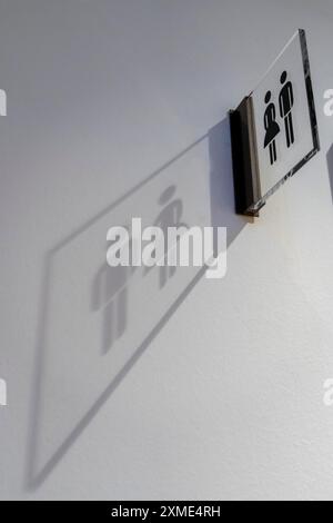 Transparent sign, indication of toilets, WC, with shade Stock Photo - Alamy