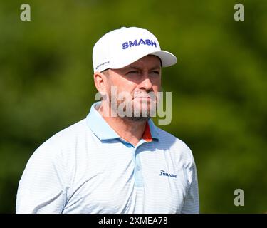 Graeme McDowell of Smash GC walks from the 12th tee during the second ...
