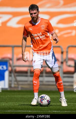James Husband #3 of Blackpool during the pre-game warmup in, on 12/29 ...
