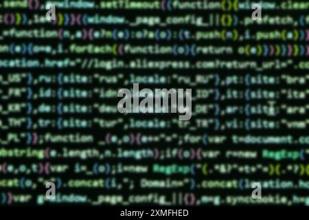 Blurry unfocused programming coding screen, web developer coding screen ...