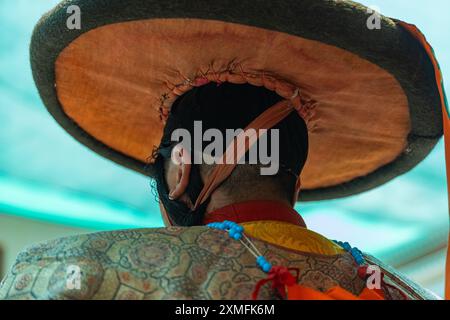 An abstract portrait of a Buddhist monk wearing a traditional hat and ...