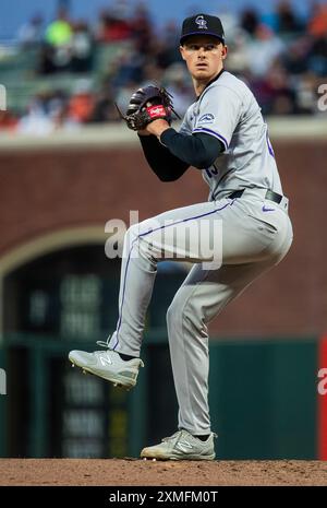 Colorado Rockies pitcher Tanner Gordon (29) warms up in an MLB game ...