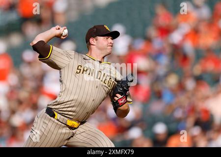San Diego Padres pitcher Michael King throws to an Athletics batter ...