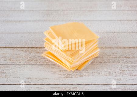 Cheese slices individually wrapped in plastic Stock Photo - Alamy