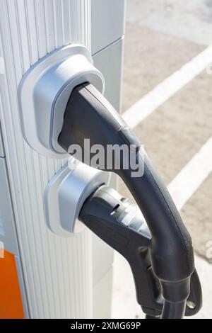 An electric vehicle charger is seen in Ottawa on June 27, 2023. THE ...