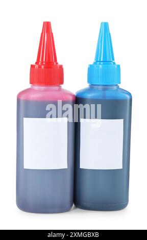 Bottles of different printer ink isolated on white Stock Photo - Alamy