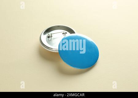 Button badges on beige background, flat lay. Mockup for design Stock ...