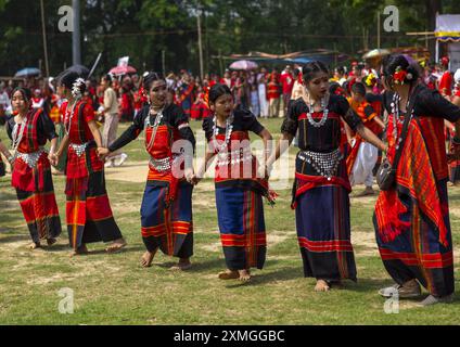 Chakma women in traditional clothing celebrating Biju festival ...
