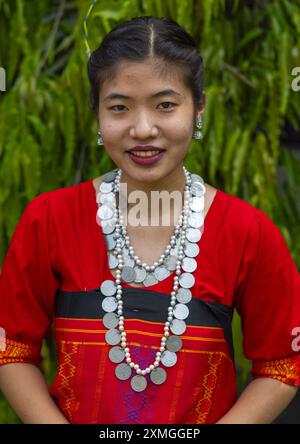 Chakma young woman in traditional clothing celebrating Biju festival ...