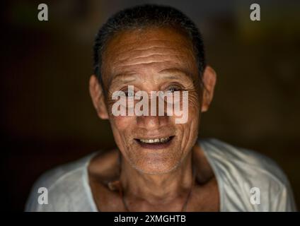 Portrait of a bangladeshi Chakma tribe man looking away, Chittagong ...