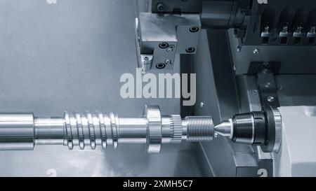 Manufacturing CNC professional lathe machine. Industrial concept. Close ...