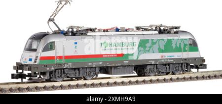 Electric locomotive engine and tracks model railway cut out still life ...