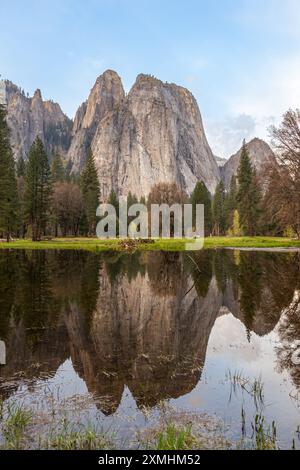 Middle Cathedral Rock reflecting in Merced River at Yosemite Stock ...