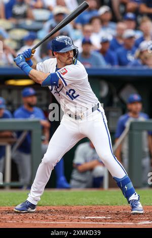 Kansas City Royals' Nick Loftin follows through on an RBI double ...