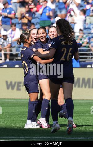 Seattle Reign FC forward Emeri Adames steps to the ball to shoot ...