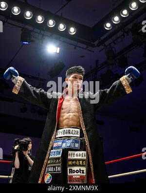 Tokyo, Japan. 19th July, 2024. Shu Utsuki enters the ring before the OPBF lightweight bout at ...