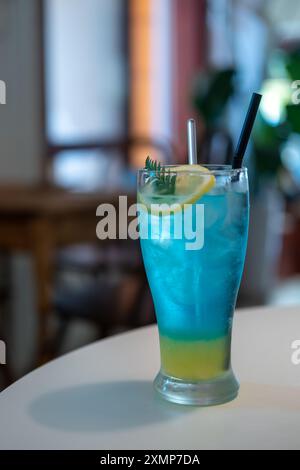 Blue lemonade soda served in a cup with lemon Stock Photo - Alamy