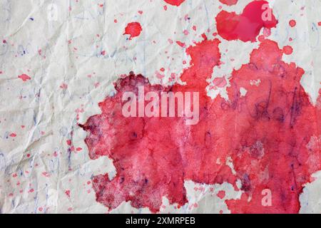 Sheet of paper with blood drops , mystery and damage, red paint or ...