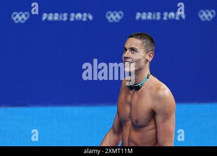 David Popovici of Romania reacts after winning gold medal in the men's ...