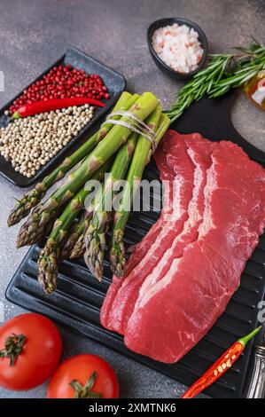 Raw beef marble bacon slices over board Stock Photo - Alamy