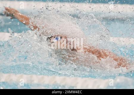 Thomas Ceccon of Italy competes in the 100m Backstroke Men Heats during ...