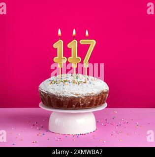 Birthday Cake With Candle Number 117 - On Green Background Stock Photo ...